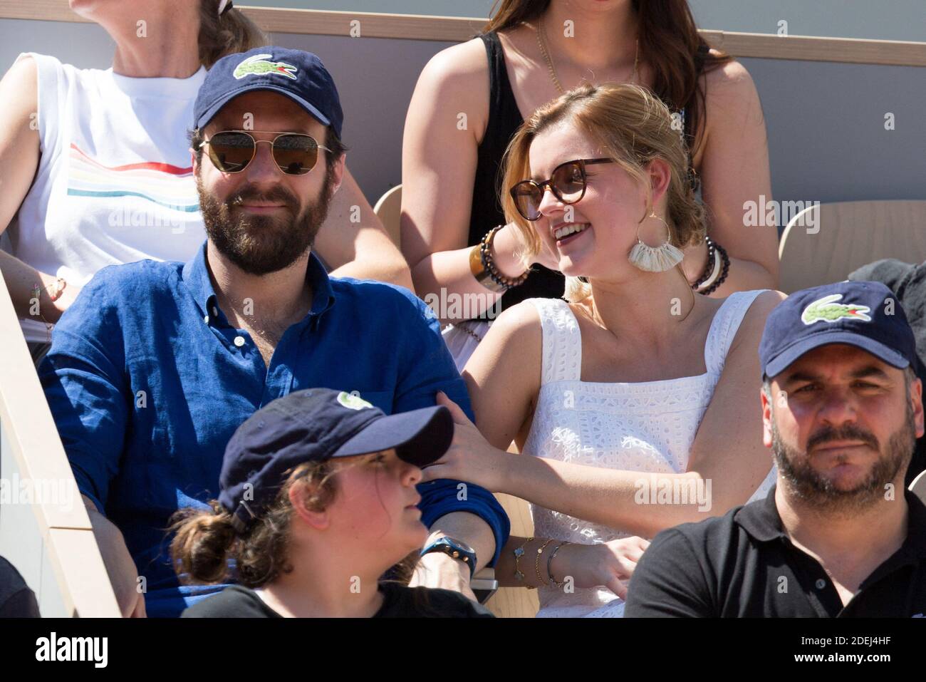 Charlotte Peretti and Antoine Gouy in stands during French Tennis Open ...