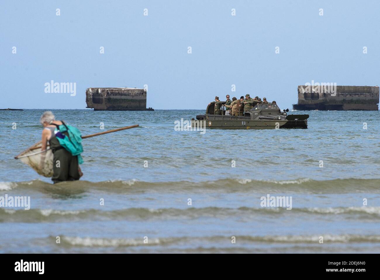 Shrimp fisherman with old us army amphibious vehicle at Arromanches, in ...