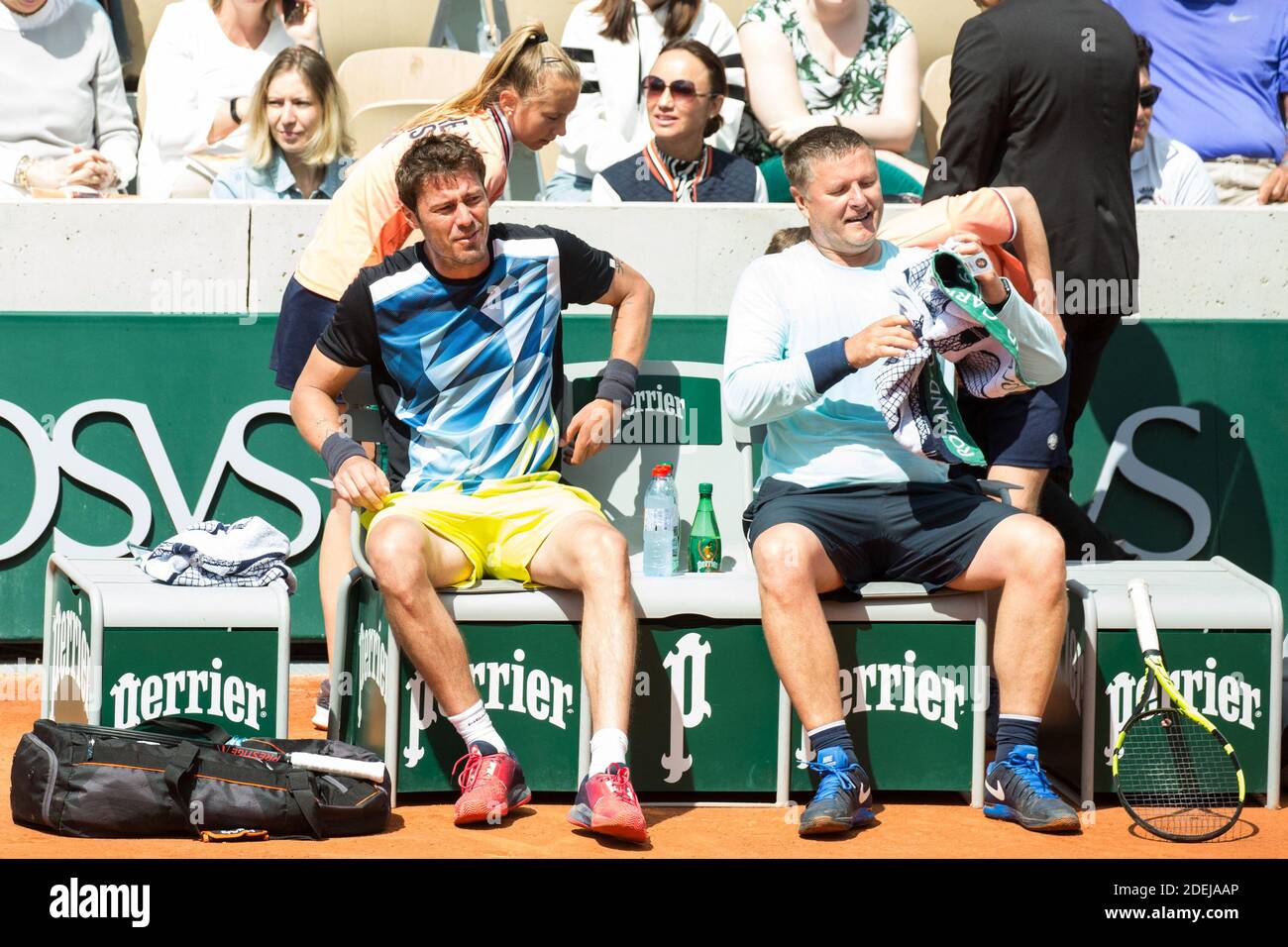 Marat Safin and Ievgueni Kafelnikov in action during French Tennis Open ...