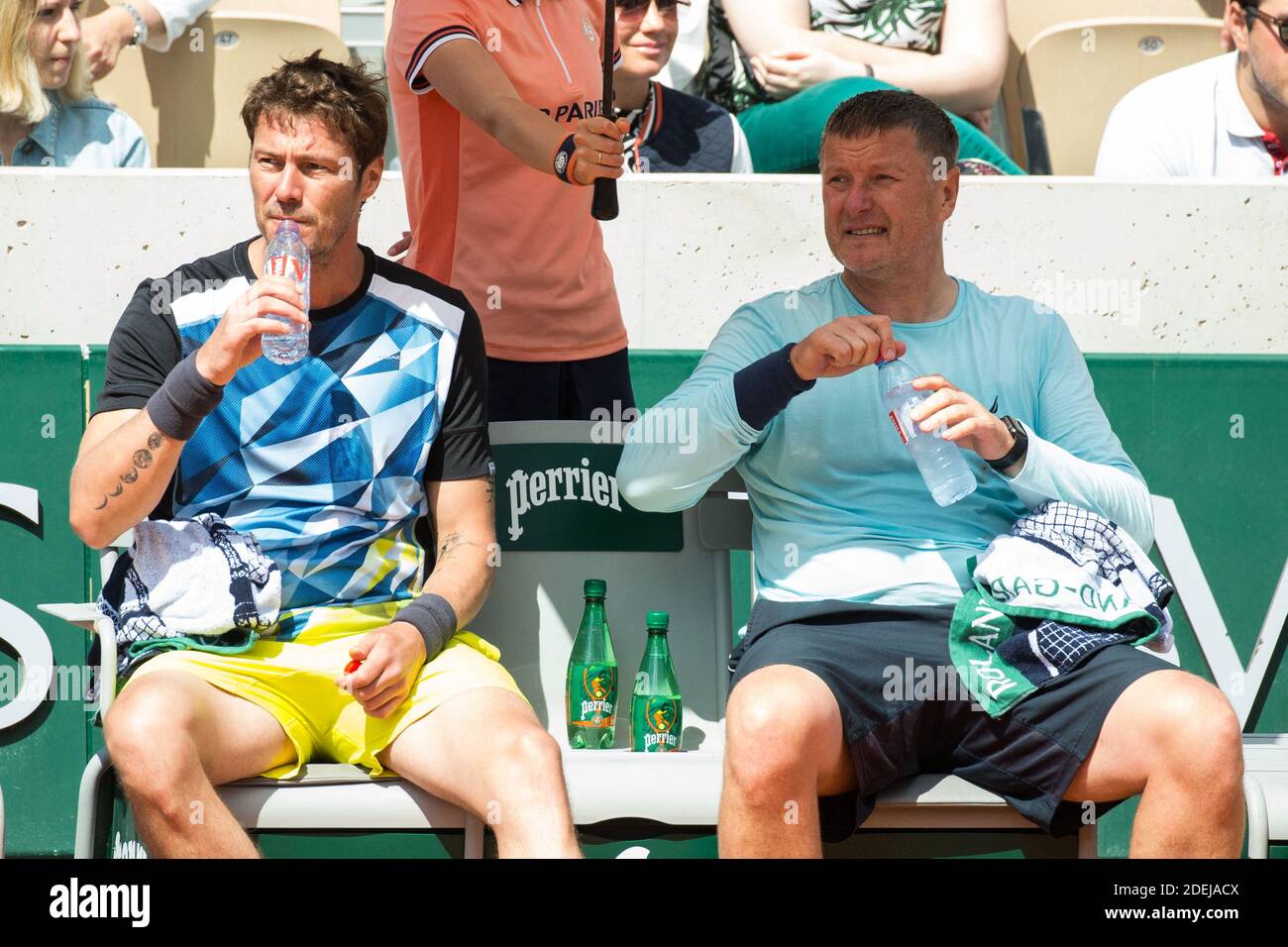 Marat Safin and Ievgueni Kafelnikov in action during French Tennis Open ...