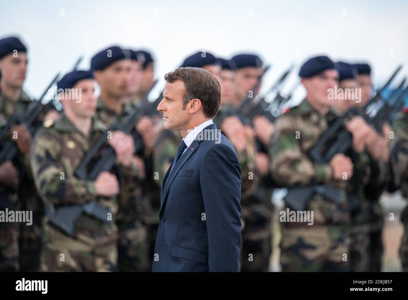 French President Emmanuel Macron and wife Brigitte Macron attend a ...