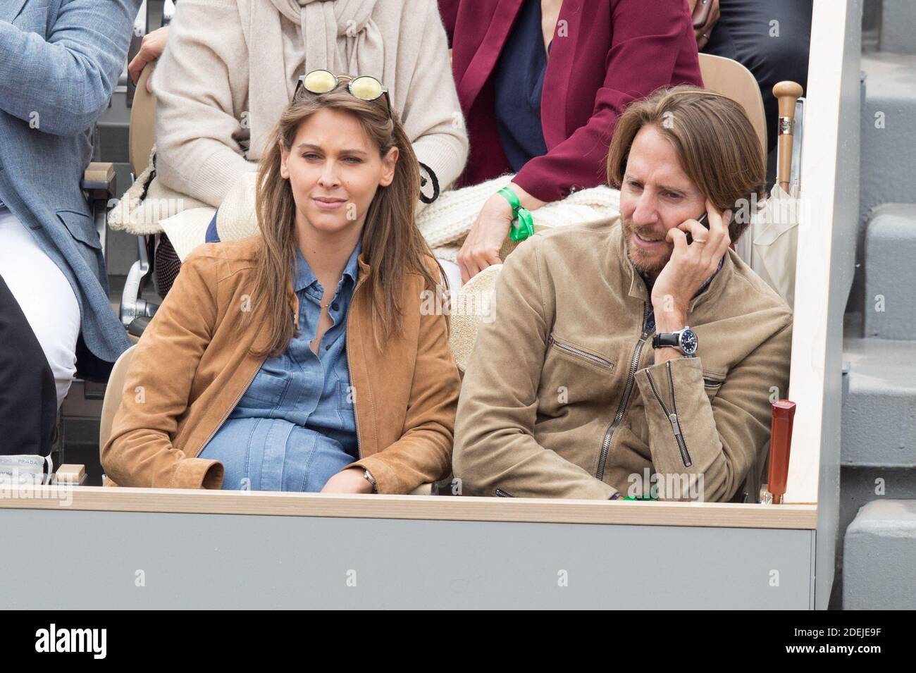 Ophelie Meunier pregnant and Mathieu Vergne stands during French Tennis ...