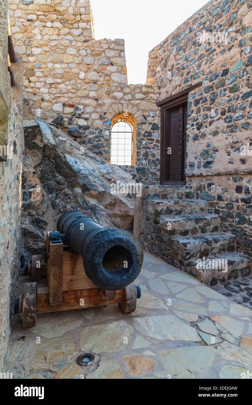 Middle East, Arabian Peninsula, Oman, Muscat, Muttrah. Ancient cannon ...