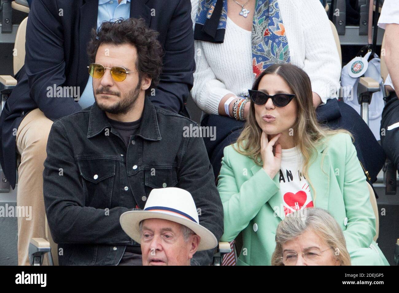 Amir Haddad and his wife Lital in stands during French Tennis Open at ...