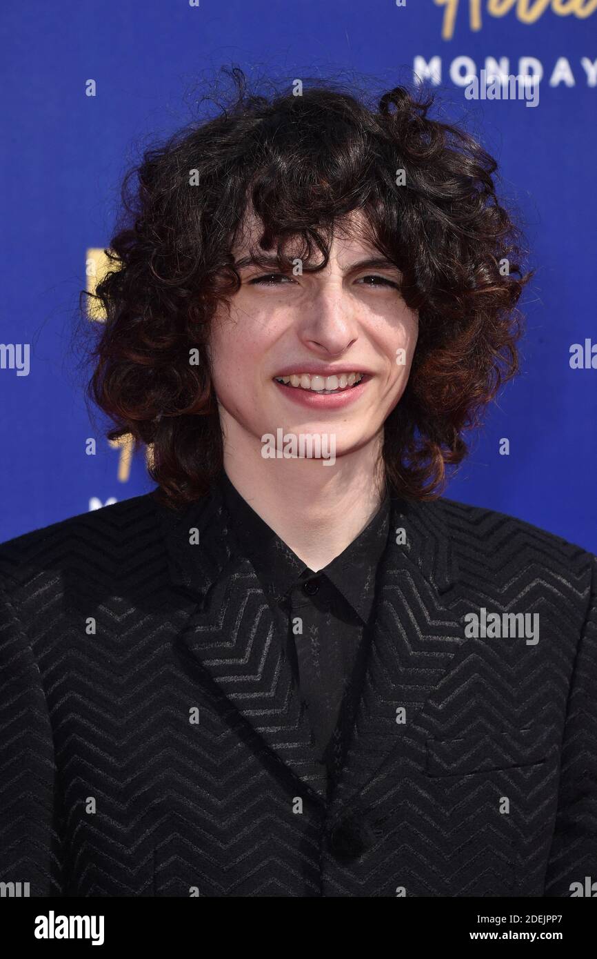 Finn Wolfhard attends the 2019 MTV Movie and TV Awards at Barker Hangar ...