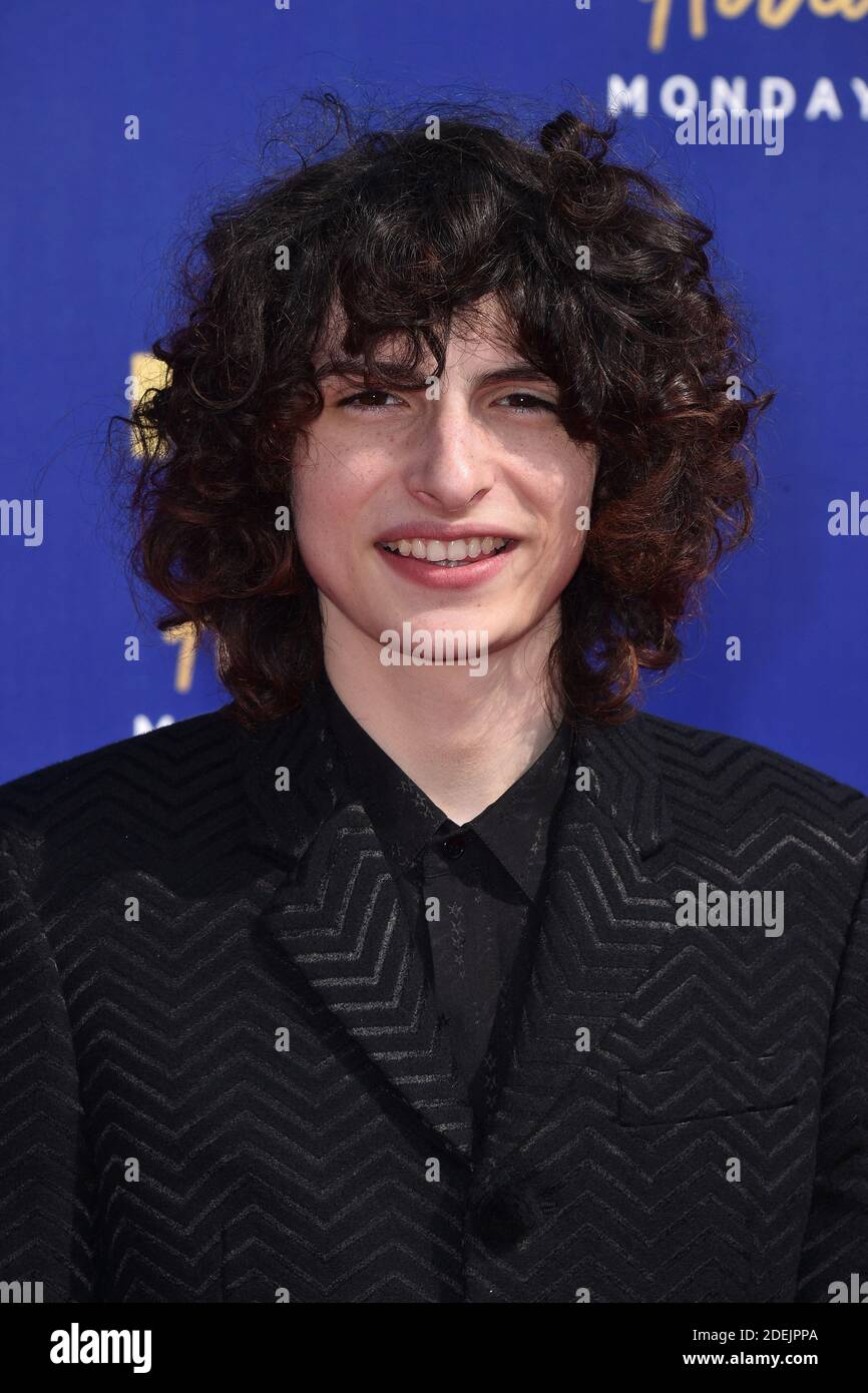 Finn Wolfhard attends the 2019 MTV Movie and TV Awards at Barker Hangar ...