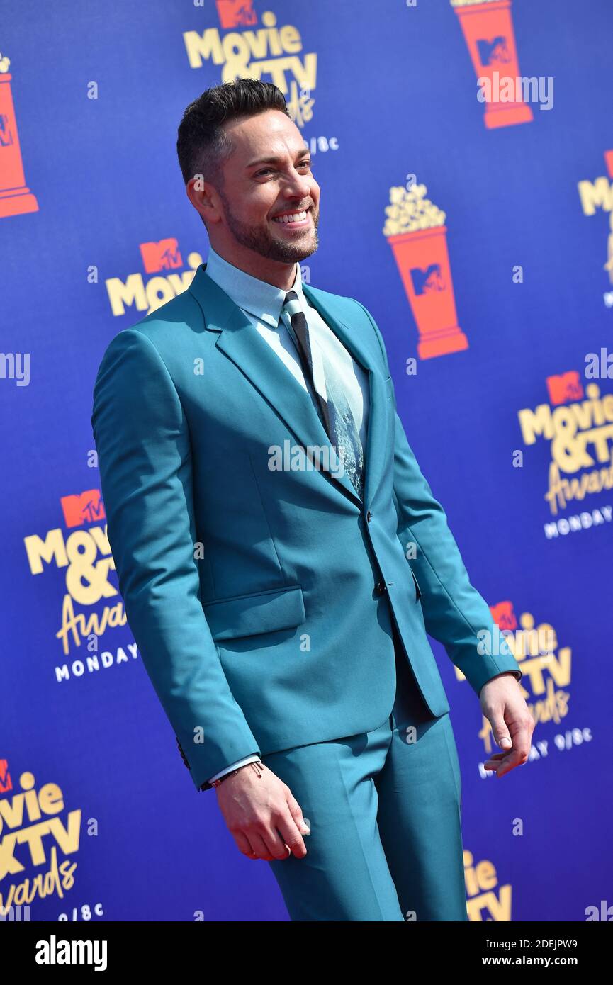 Zachary Levi attends the 2019 MTV Movie and TV Awards at Barker Hangar ...