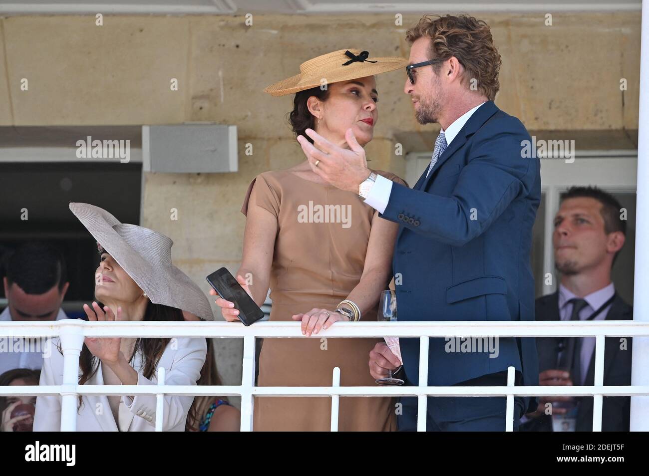 Actor Simon Baker and his wife Rebecca Rigg attend the Prix De Diane ...