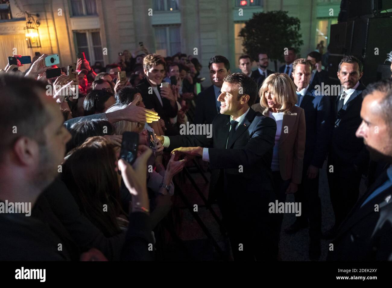 French President Emmanuel Macron in the courtyard of the Elysee Palace ...