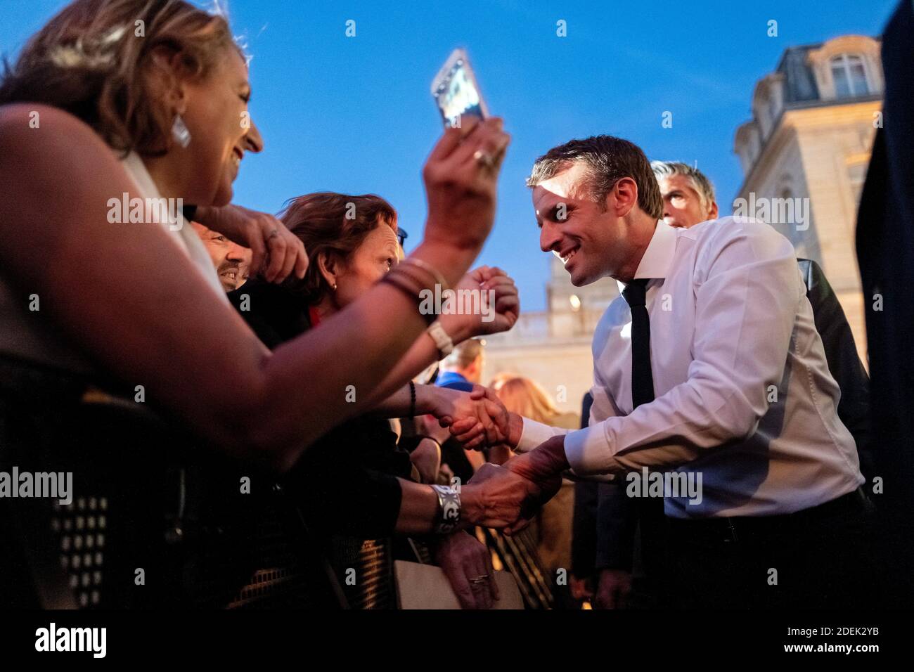 French President Emmanuel Macron in the courtyard of the Elysee Palace ...