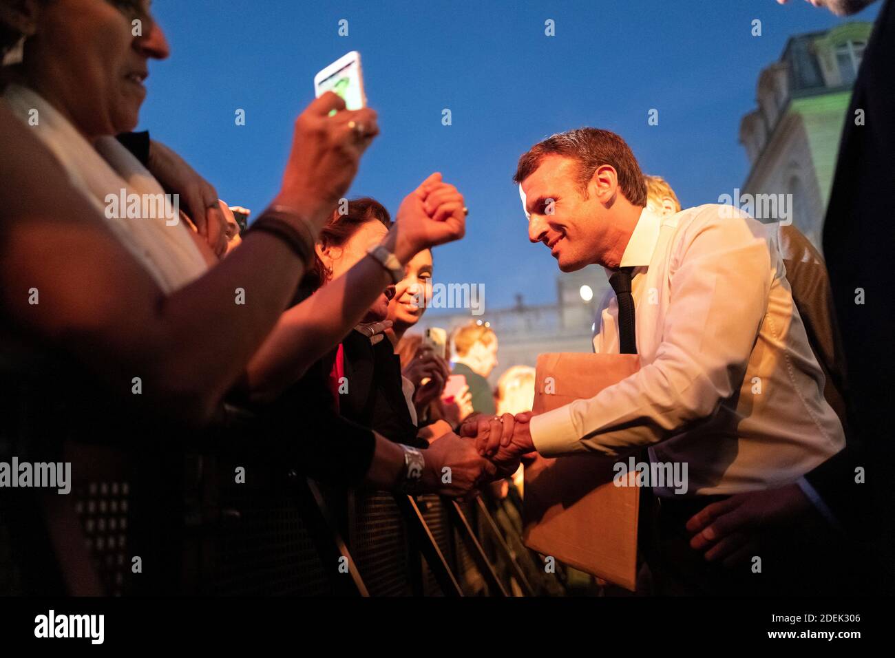 French President Emmanuel Macron in the courtyard of the Elysee Palace ...