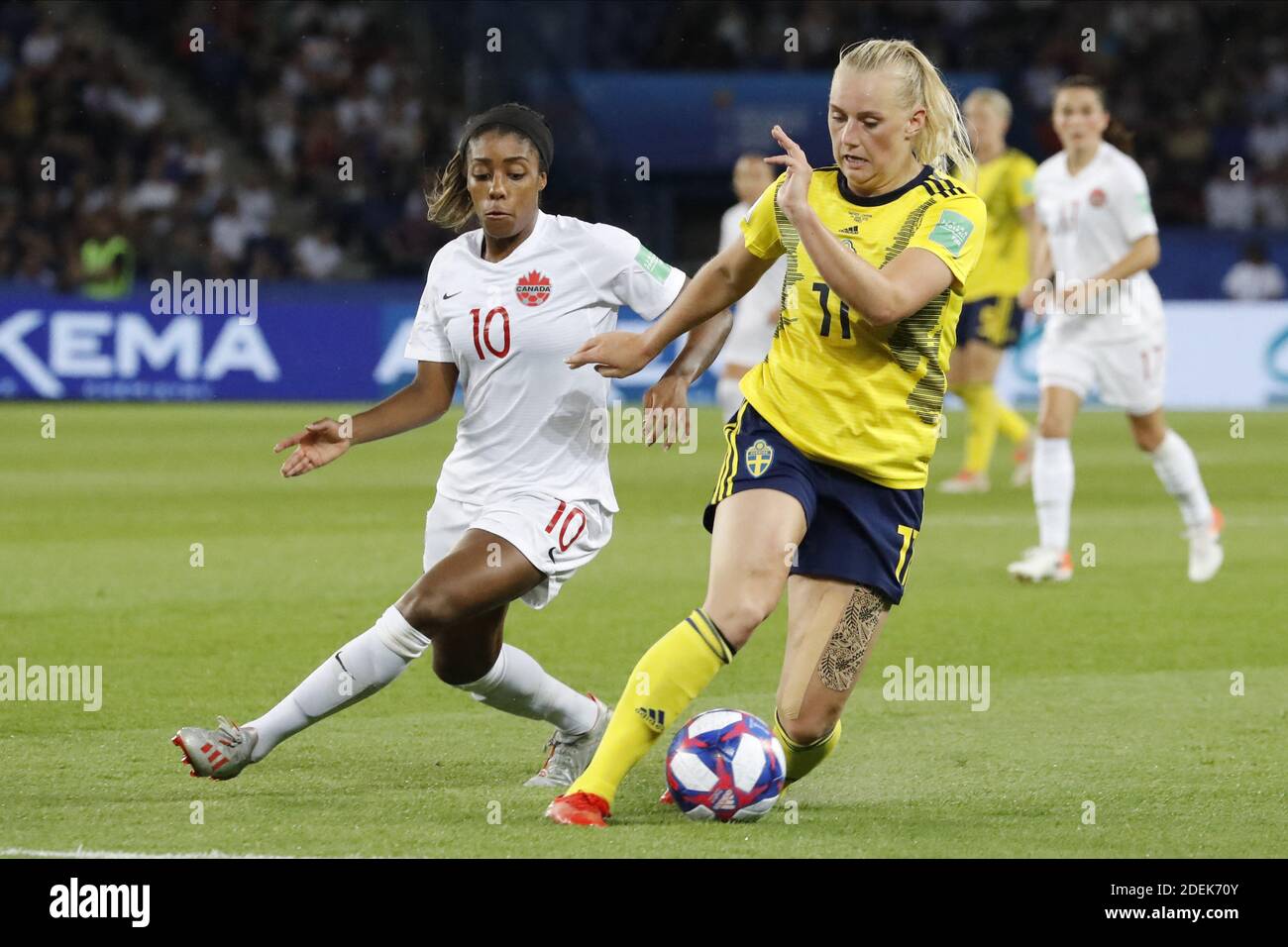 Sweden's Stina Blackstenius battling Canada's Ashley Lawrence during ...