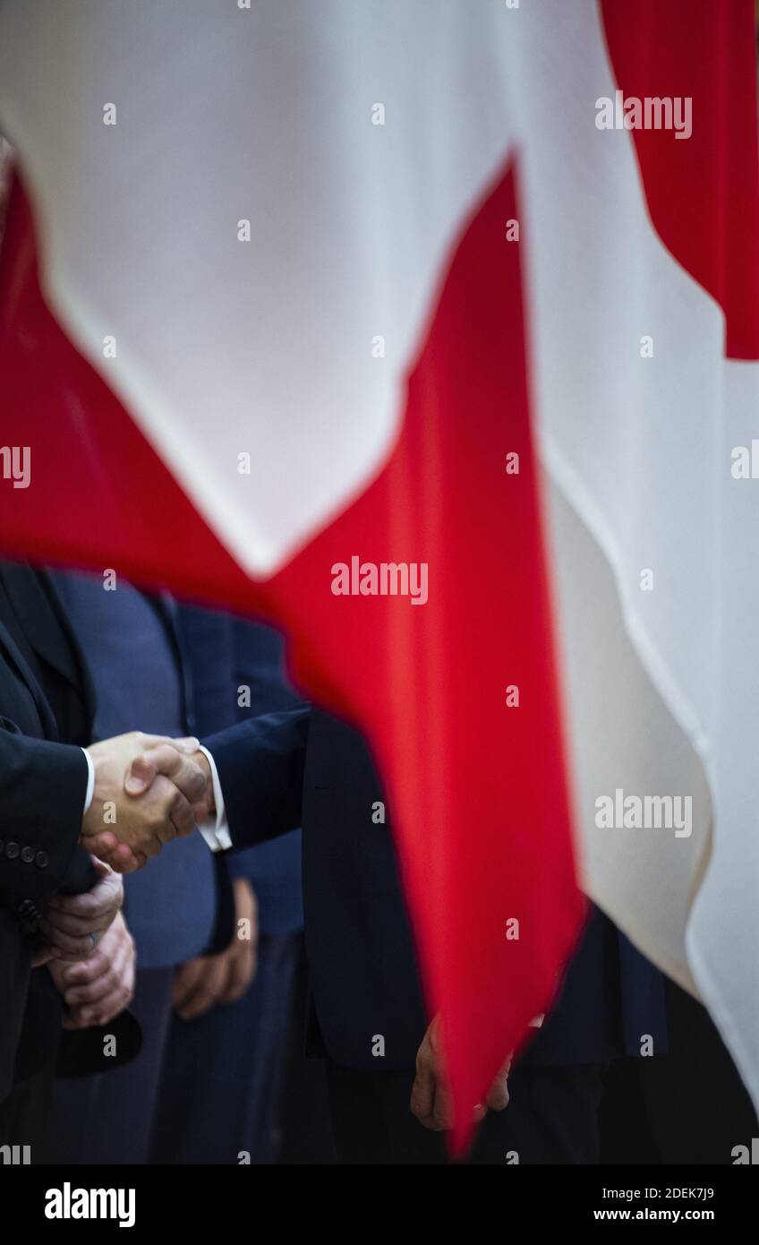 Japanese Prime Minister Shinzo Abe greets French President Emmanuel ...