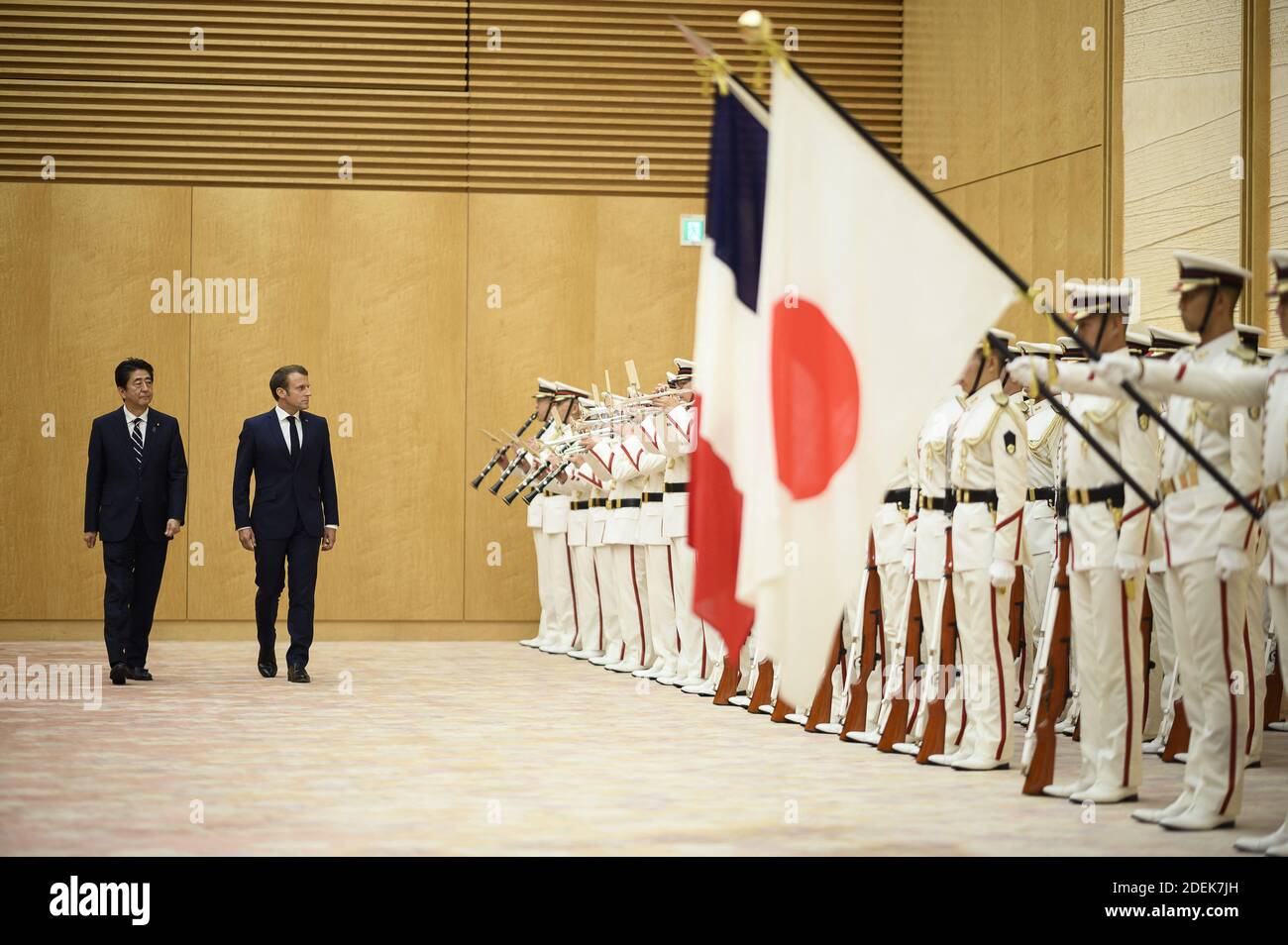 Japanese Prime Minister Shinzo Abe greets French President Emmanuel ...