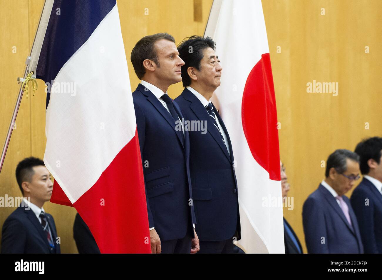 Japanese Prime Minister Shinzo Abe greets French President Emmanuel ...