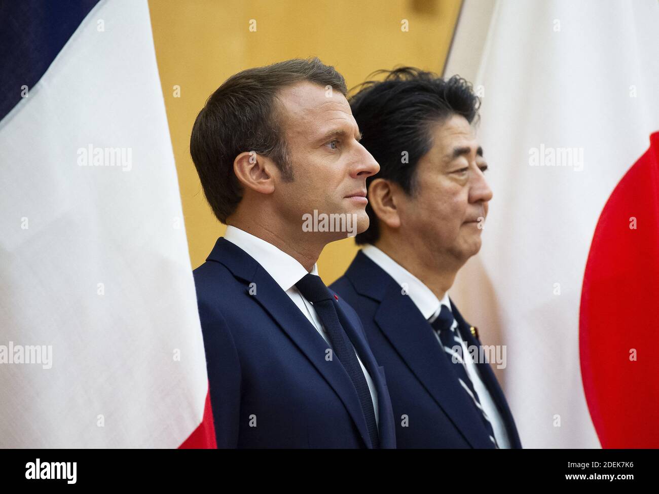 Japanese Prime Minister Shinzo Abe greets French President Emmanuel ...