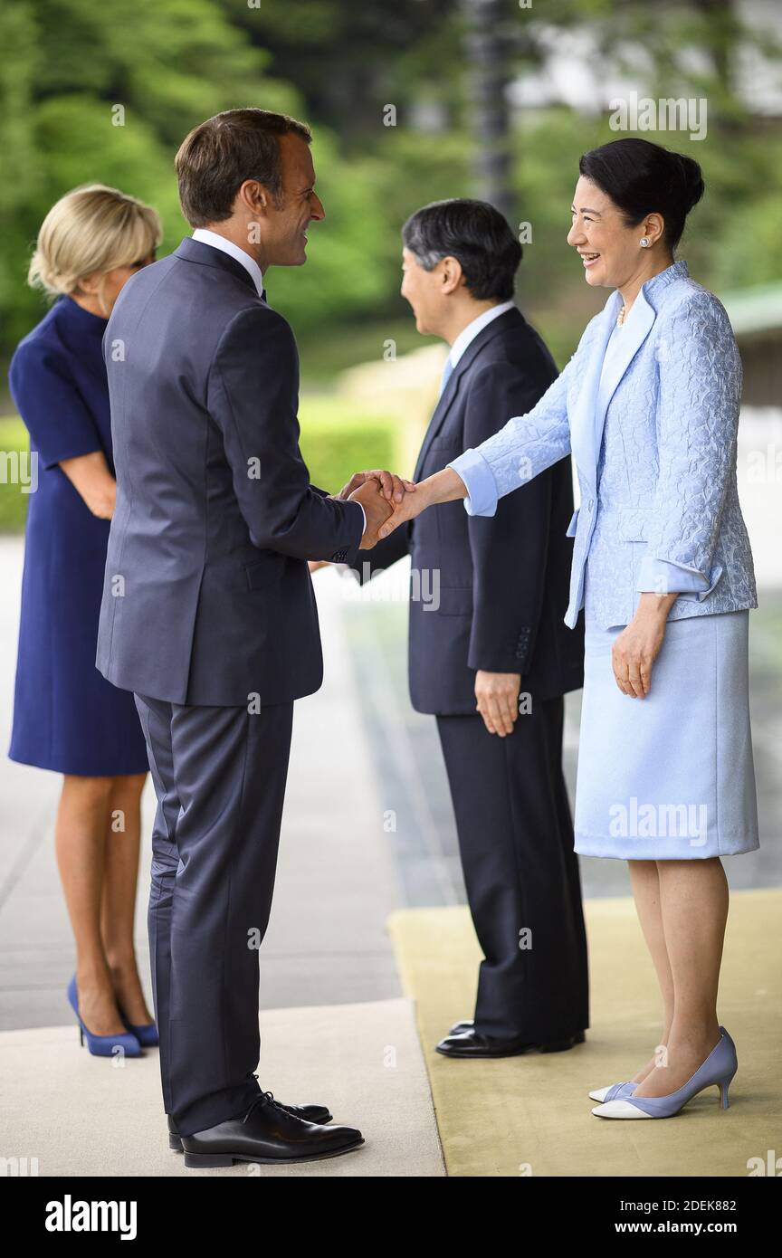 French president Emmanuel Macron and his wife Brigitte Macron are ...