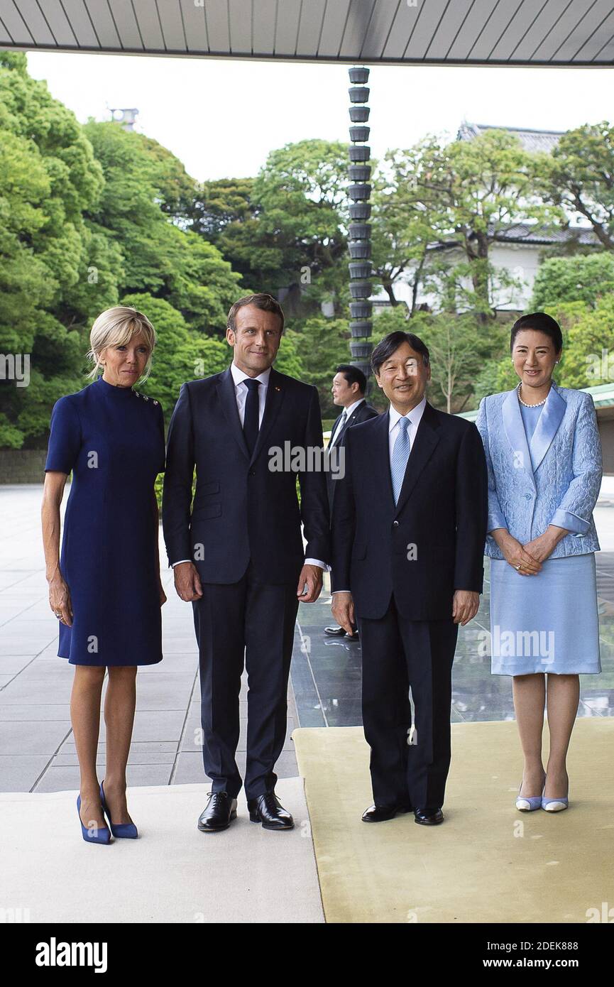 French president Emmanuel Macron and his wife Brigitte Macron are ...