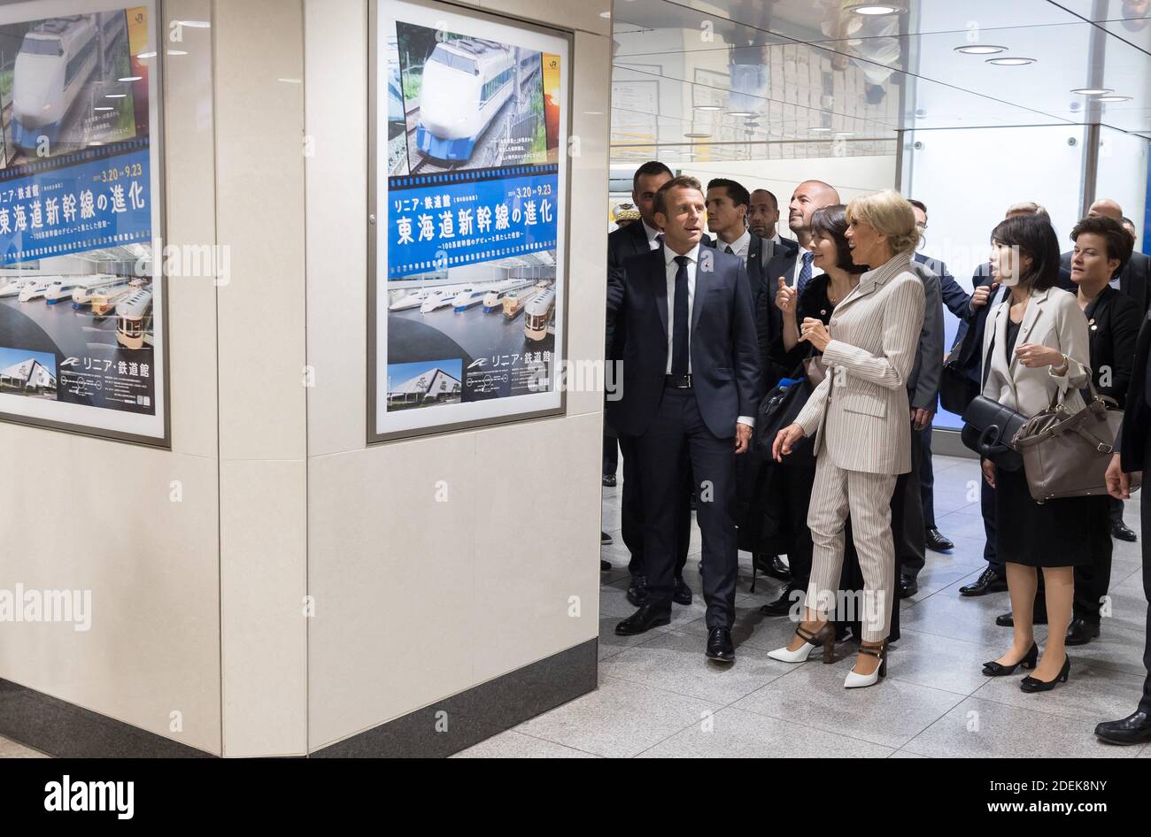 French President Emmanuel Macron and his wife Brigitte Macron walking ...