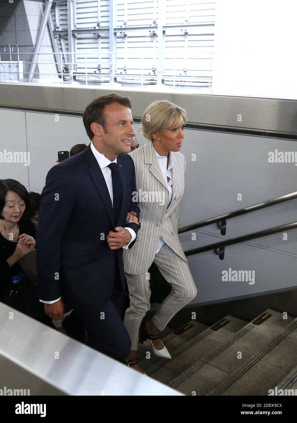 French president Emmanuel Macron and wife Brigitte Macron arrive at a ...