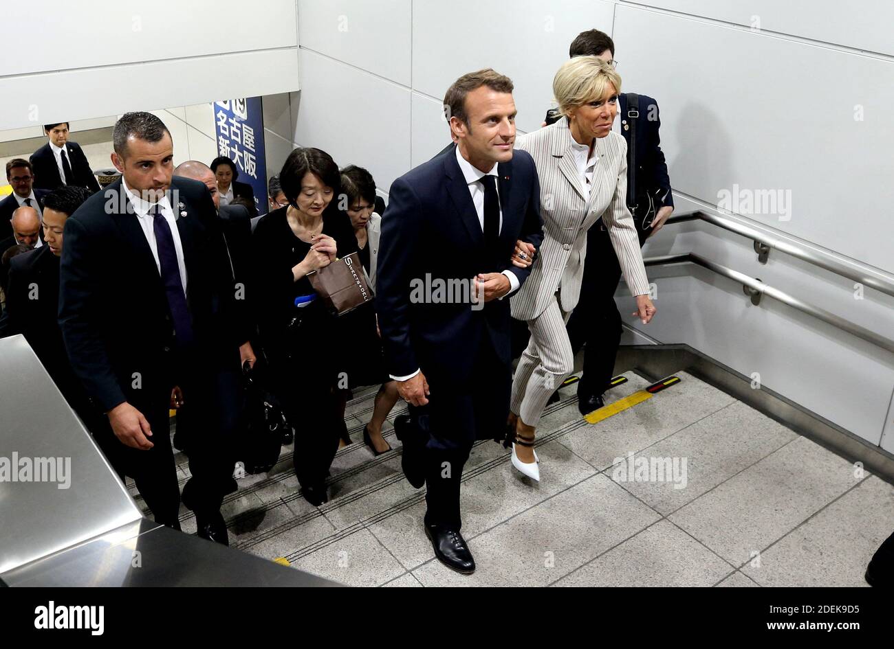 French president Emmanuel Macron and wife Brigitte Macron arrive at a ...