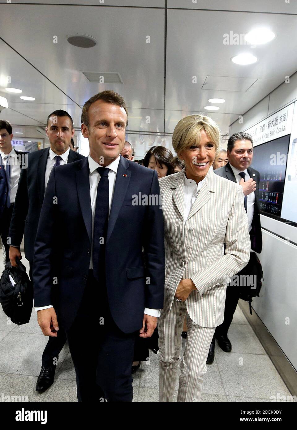 French president Emmanuel Macron and wife Brigitte Macron arrive at a ...