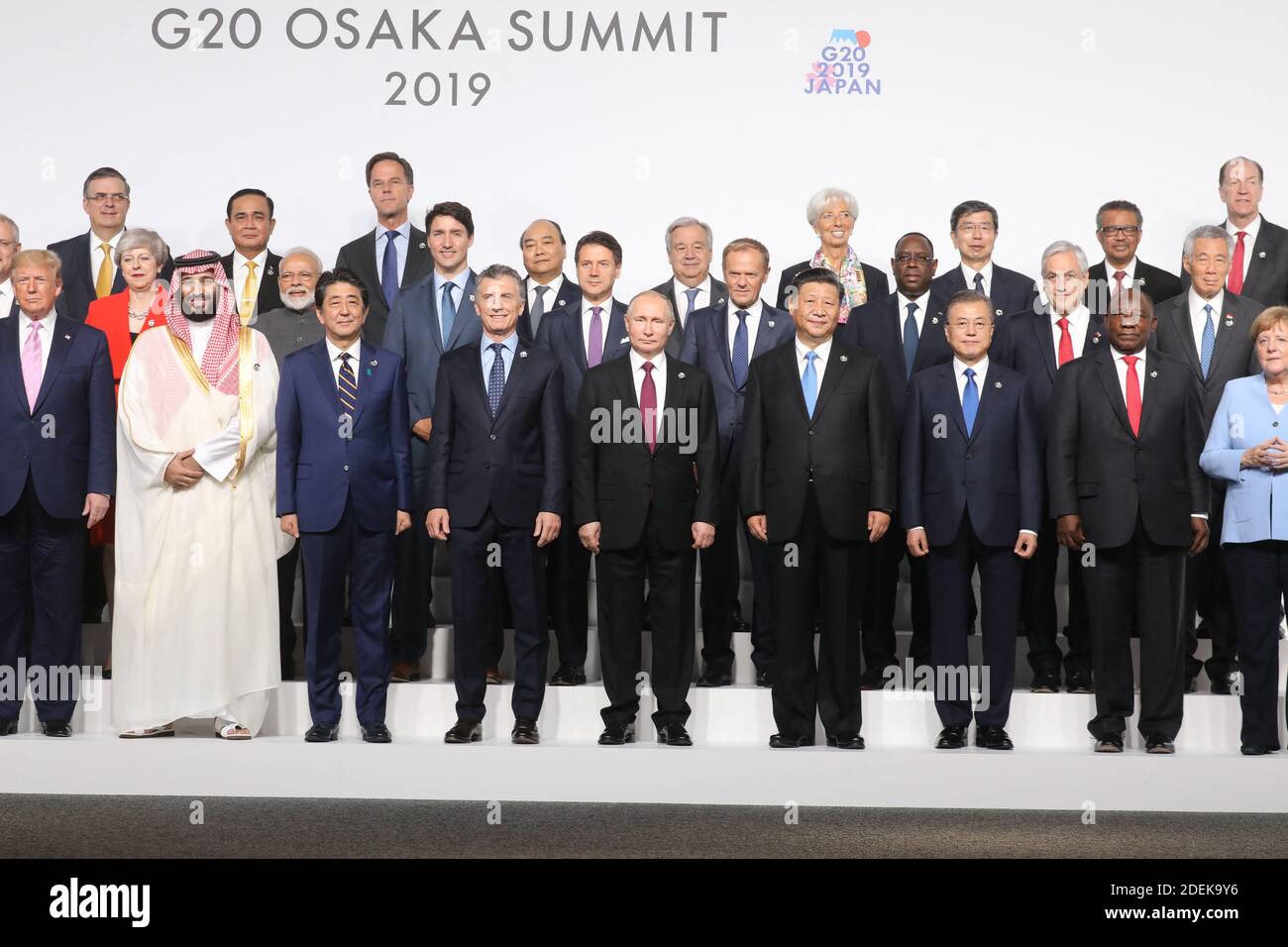 G20 leaders attend the family photo during the G20 Osaka Summit in ...