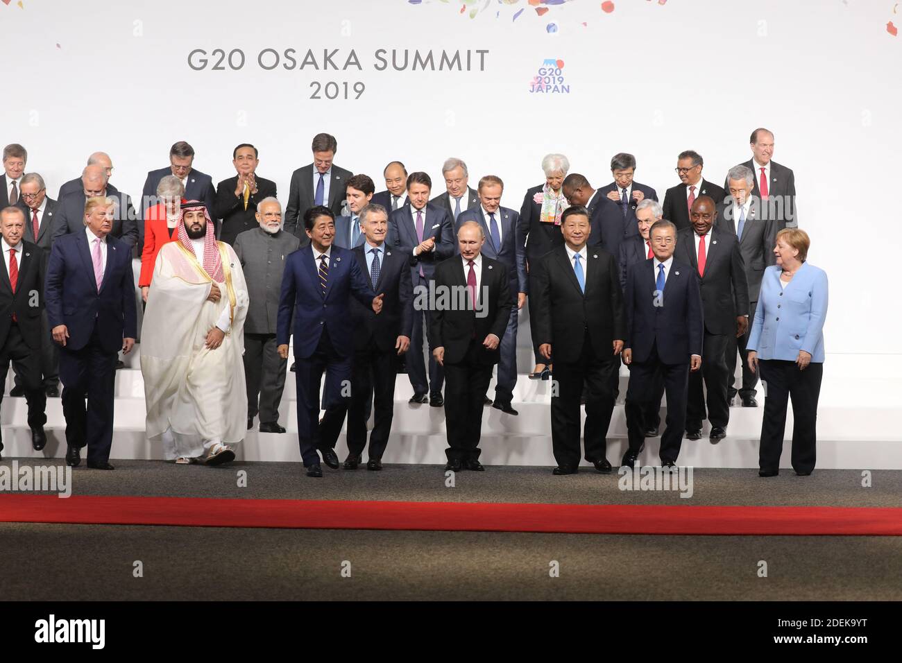 G20 leaders attend the family photo during the G20 Osaka Summit in Osaka on June 28, 2019 ...