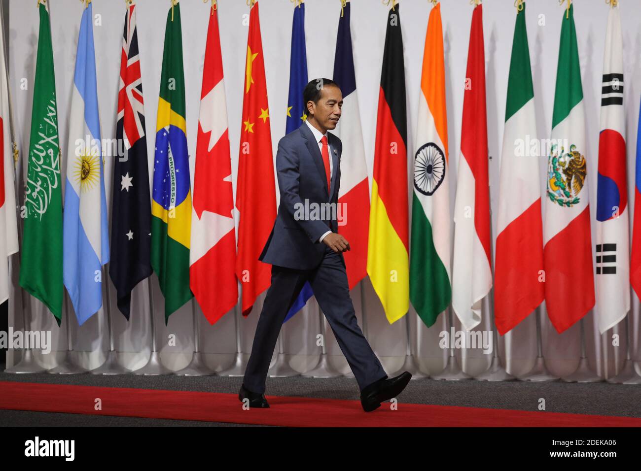 Indonesia President Joko Widodo arrives for the family photo at the G20 ...