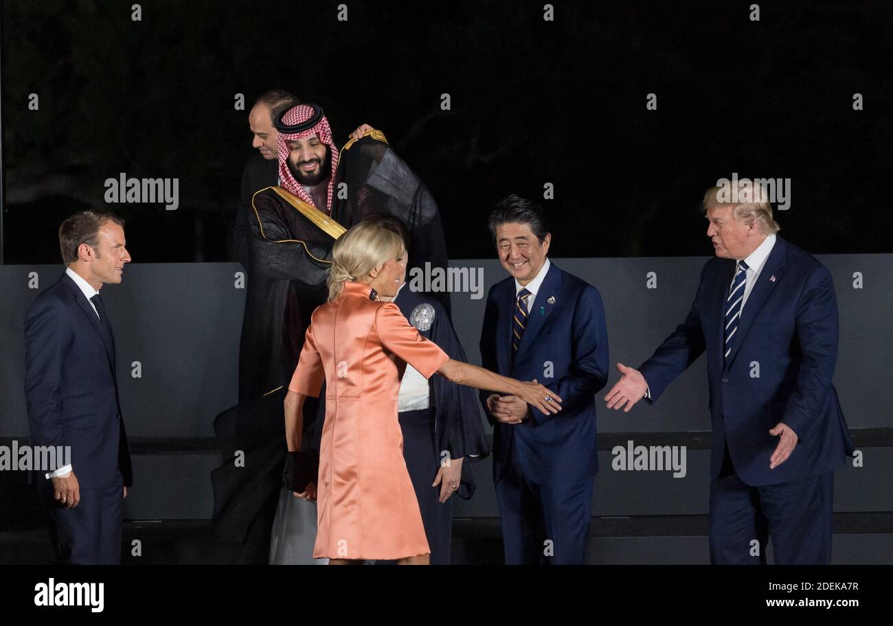 French President Emmanuel Macron, Brigitte Macron checking hands Us ...