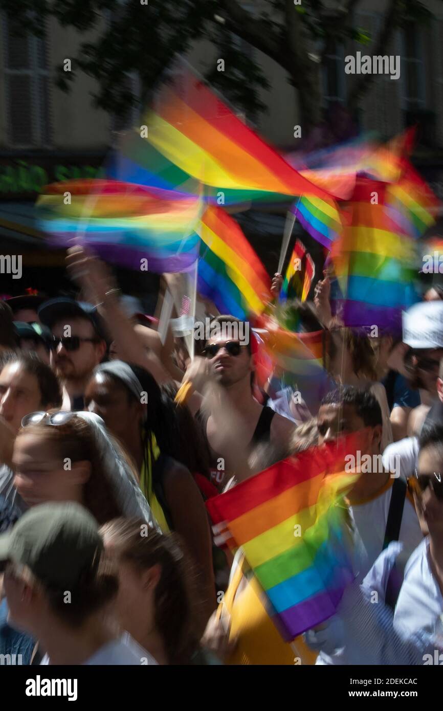 People gather in the streets of Paris to celebrate the annual Gay Pride ...