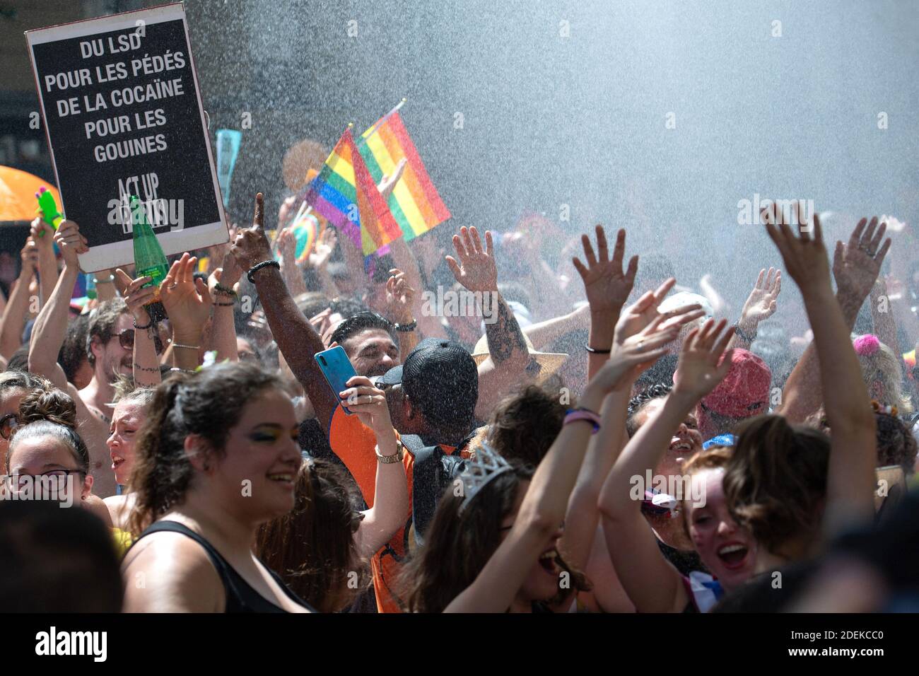 People gather in the streets of Paris to celebrate the annual Gay Pride ...