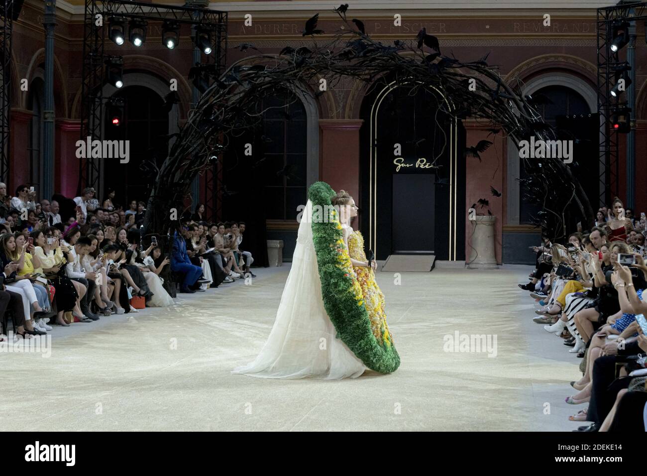 Models on the catwalk at Guo Pei runway during the Haute Couture Paris ...