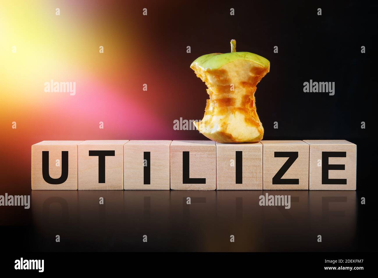 An apple core and the word UTILIZE are written on the cubes. Organic ...