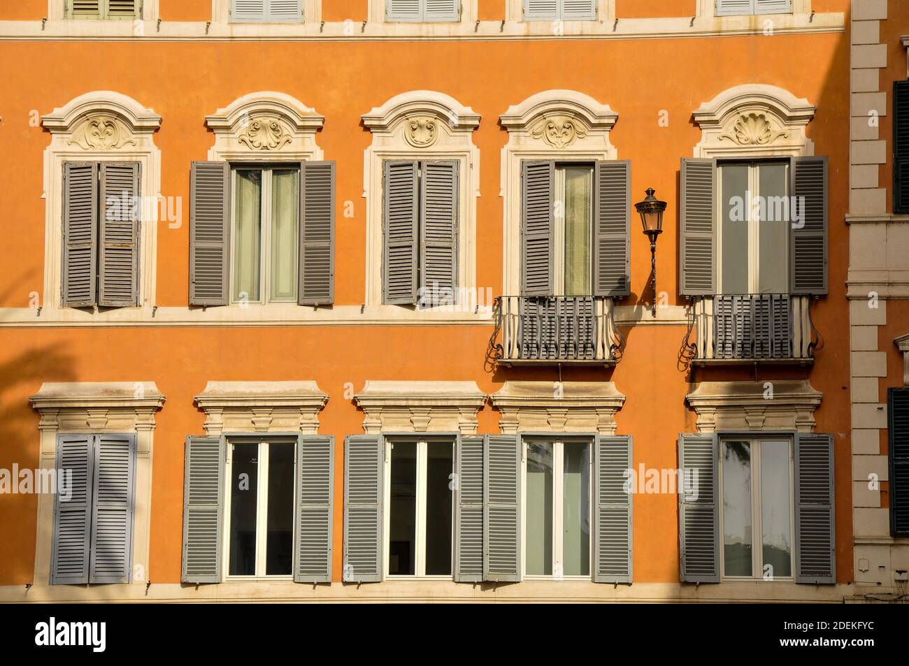 A magnificent Roman building with ornate windows and shutters Stock ...