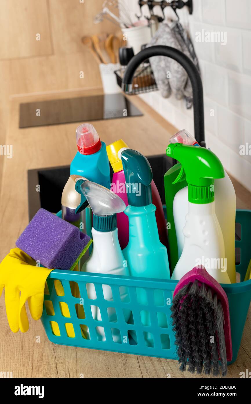 Colorful cleaning products in the kitchen Stock Photo - Alamy