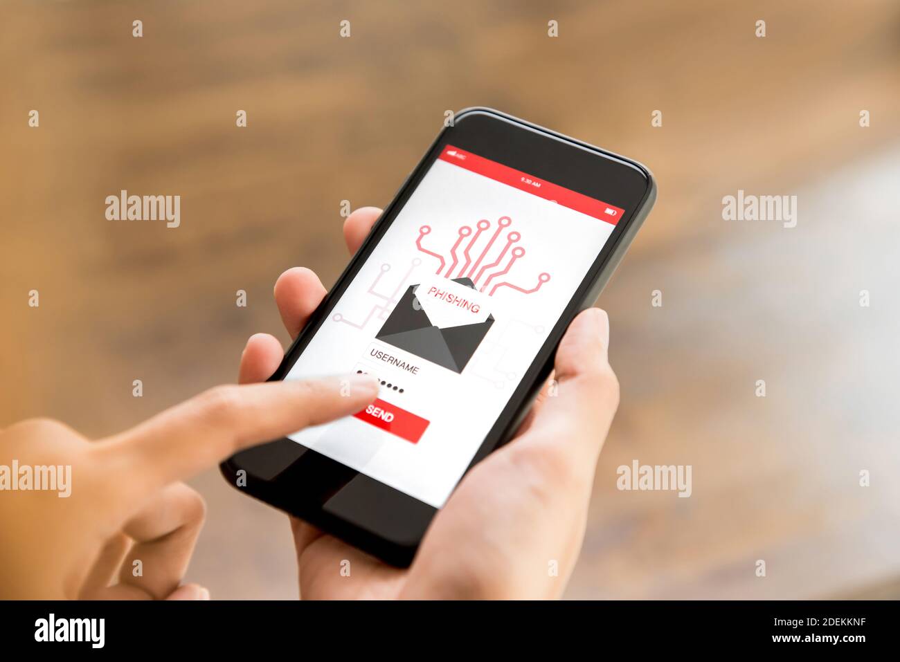 Hand touching button on smartphone screen sending back username and ...