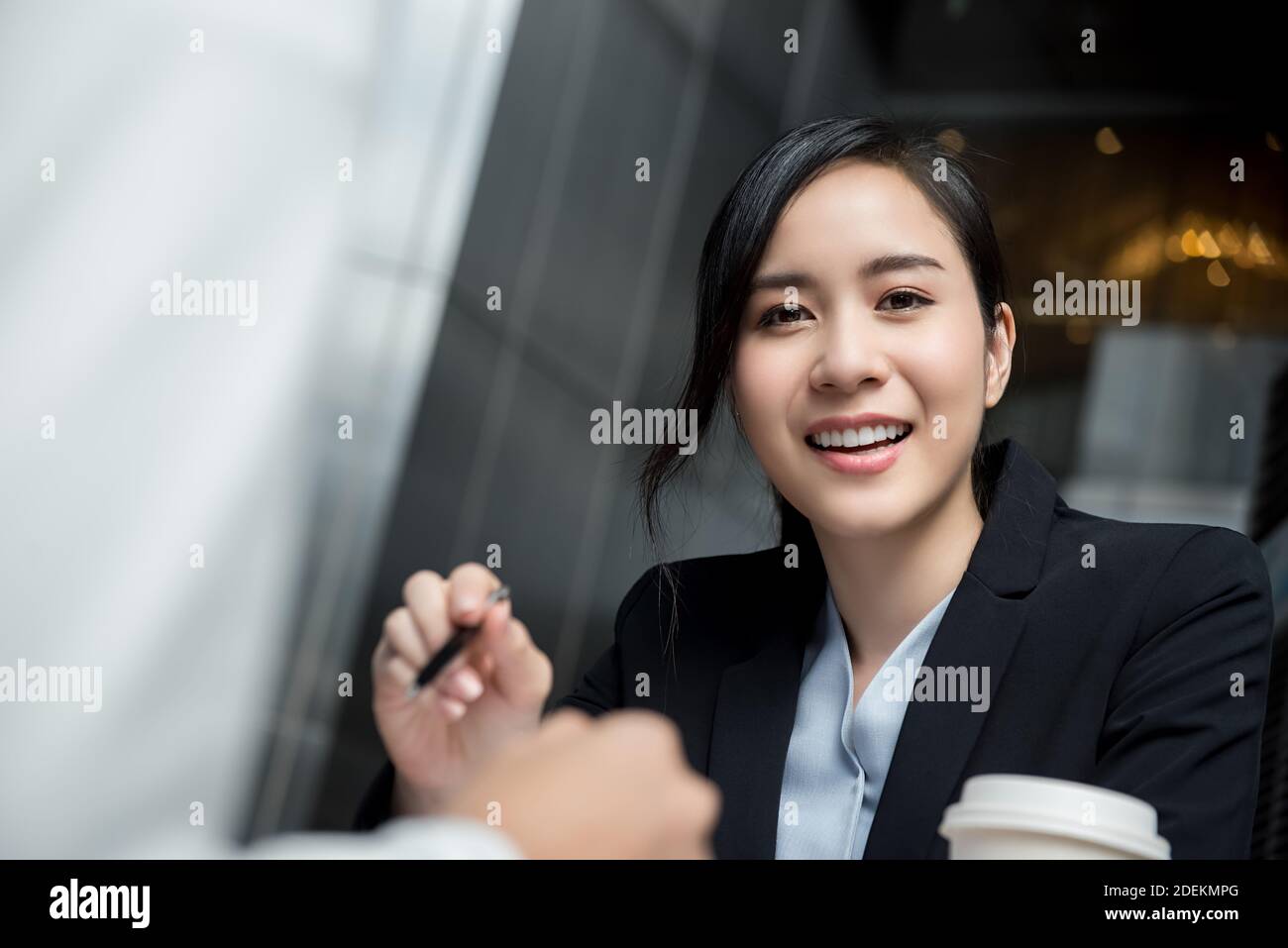 Beautiful smart and confident smiling Asian woman leader meeting with ...