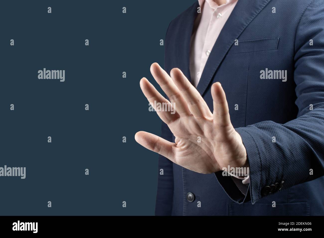 businessman with stop gesture. Businessman in suit making stop gesture ...