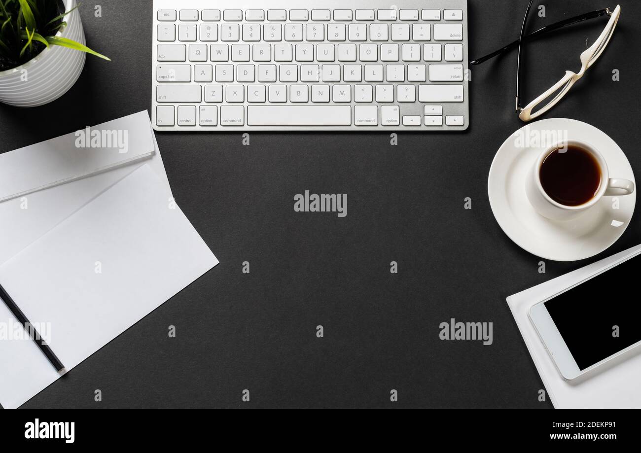 Top view of workplace with computer keyboard Stock Photo - Alamy