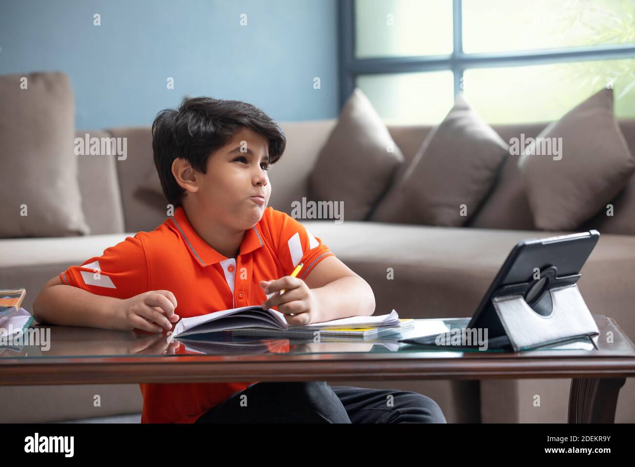 Small boy thinking hi-res stock photography and images - Alamy