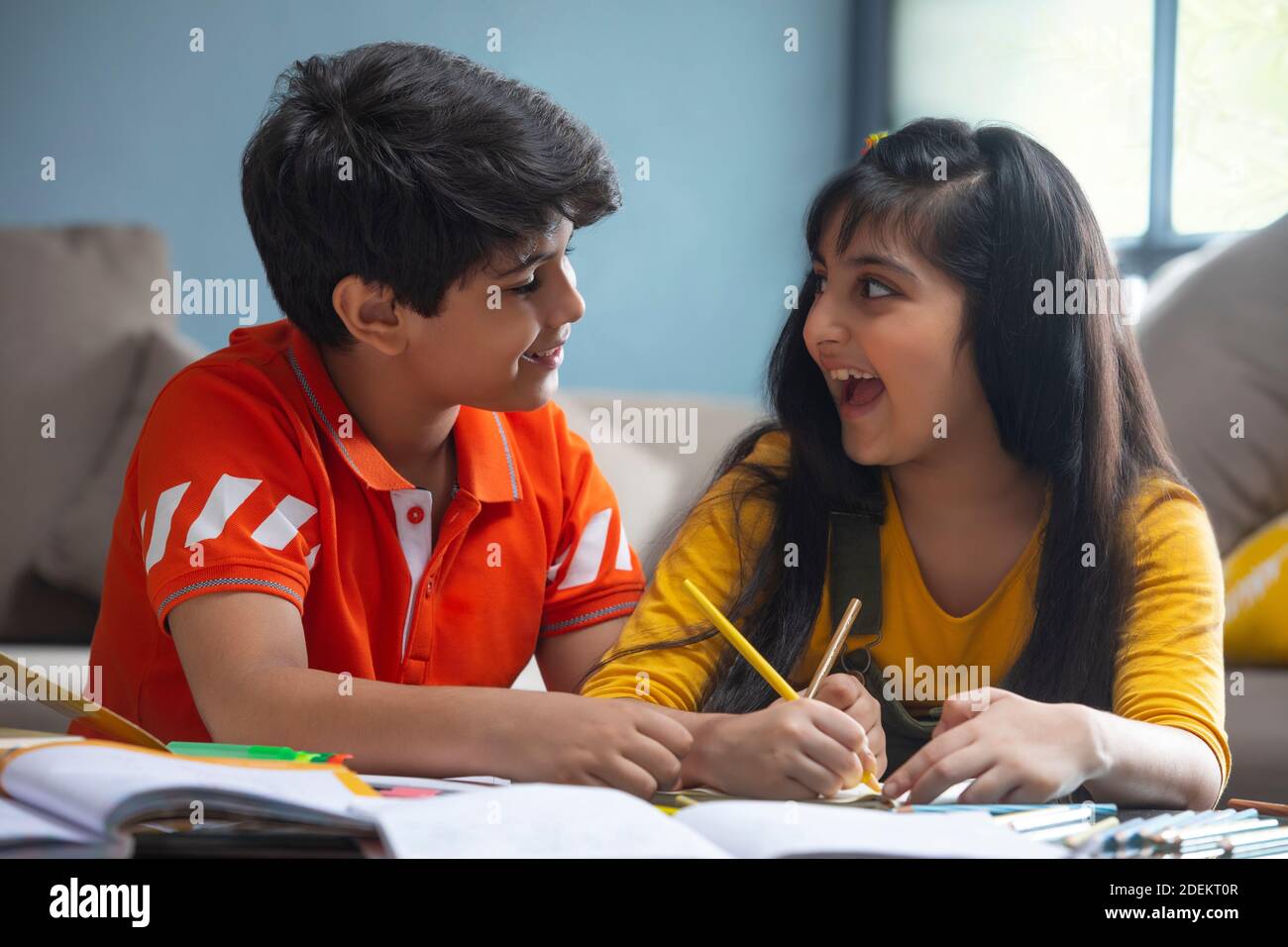 Brother and sister writing hi-res stock photography and images - Alamy