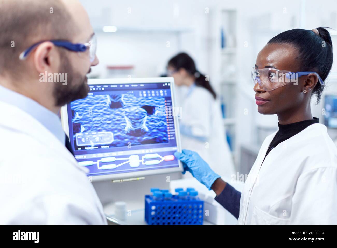 Scientist conducting an experiment hi-res stock photography and images - Alamy