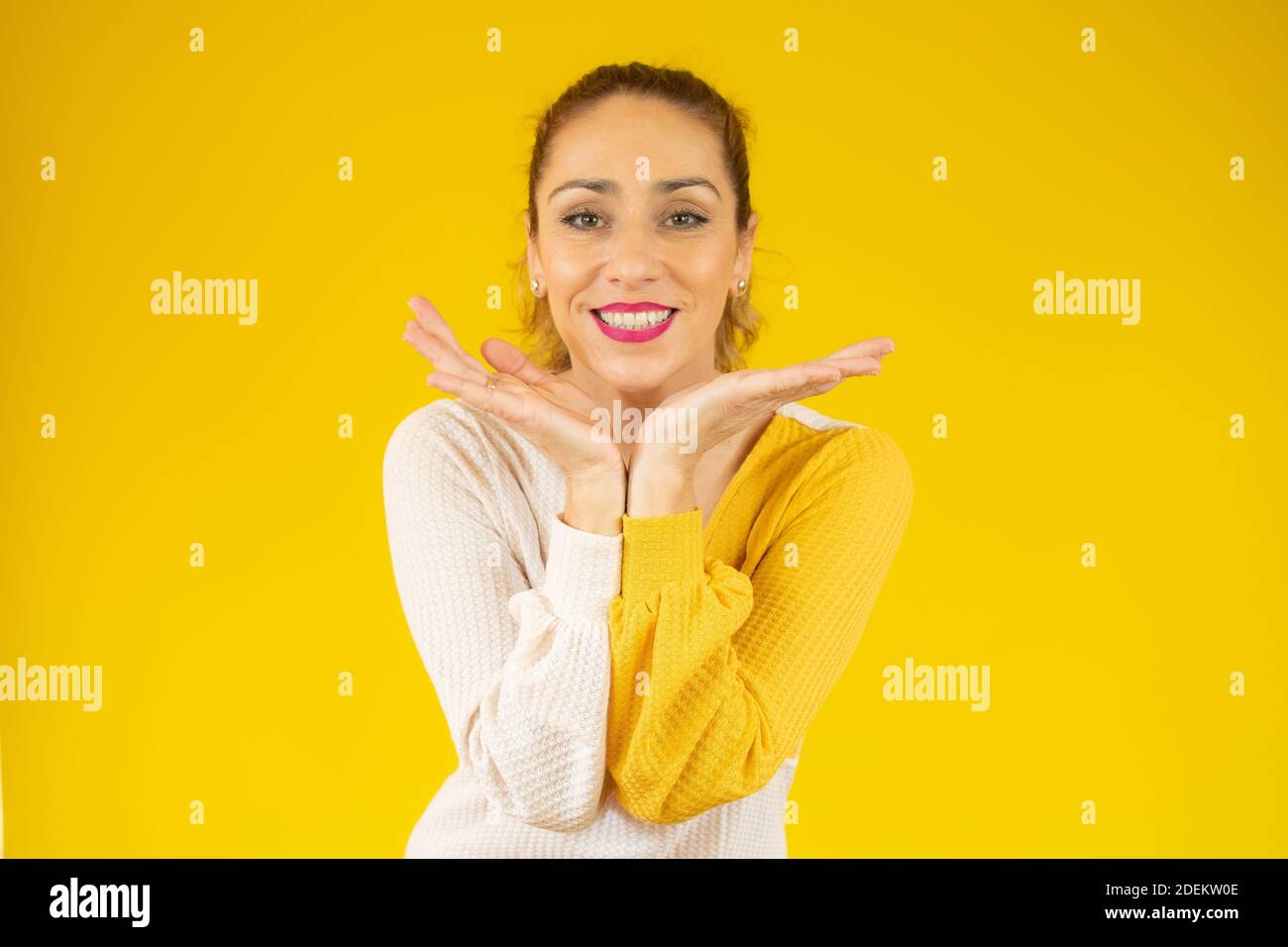 Happy smiling beautiful caucasian woman gesturing with hands and ...