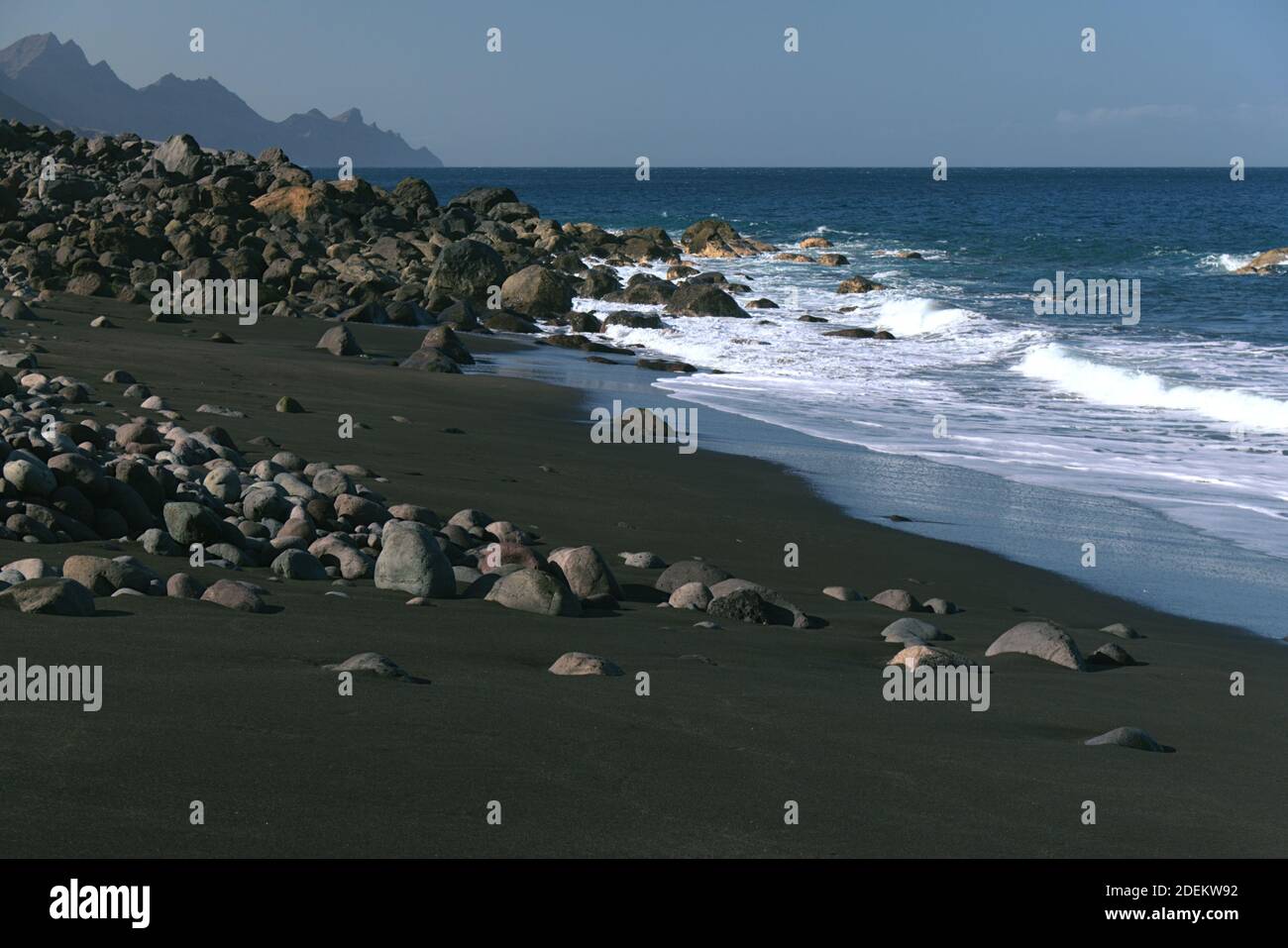 Gran Canaria, dark volcanic sand beach Playa de Guayedra in Agaete ...