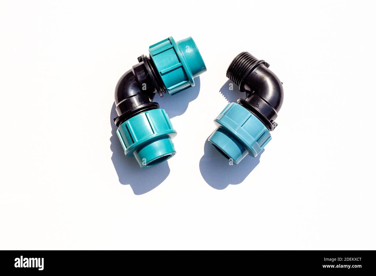 black coupling for connecting plastic pipes on a white background ...