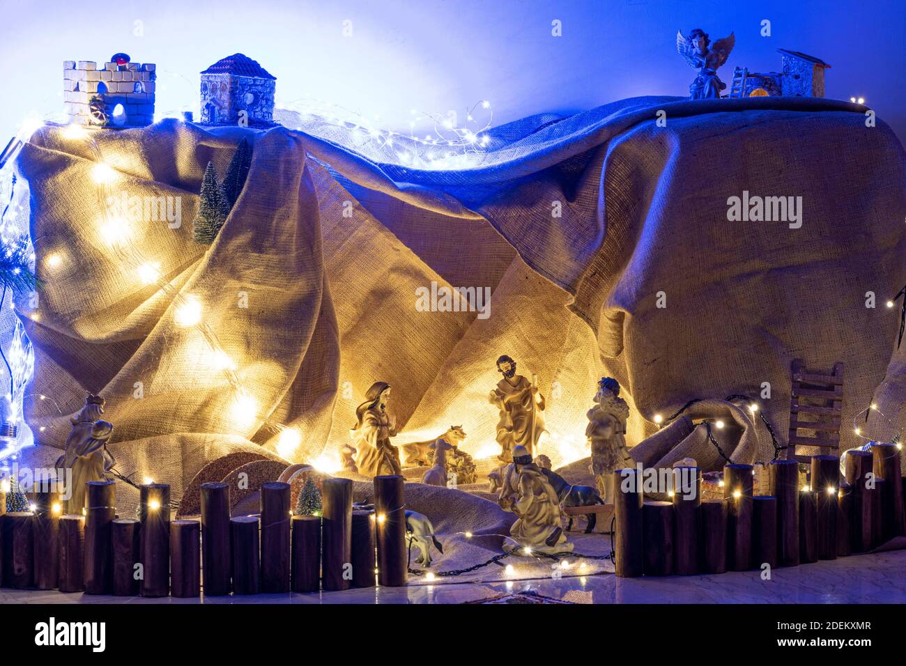 Decorated Christmas tree and creche on a blurred background, and you ...