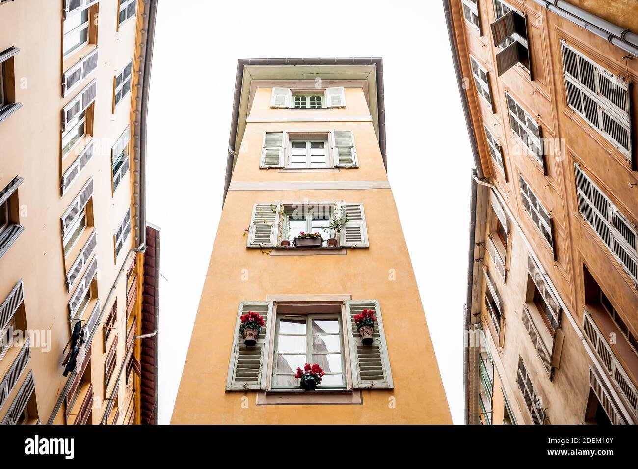 Looking up at traditional apartments in the old quarter of Nice France ...