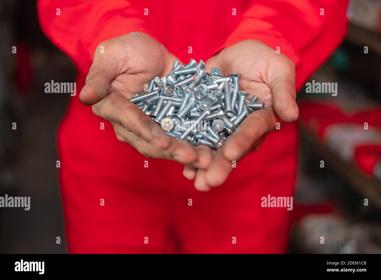 image of mechanical hands with lots of bolts in a workshop Stock Photo ...