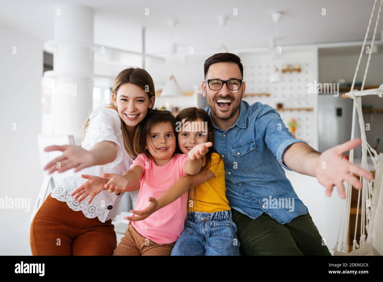 Happy family having fun times at home Stock Photo - Alamy